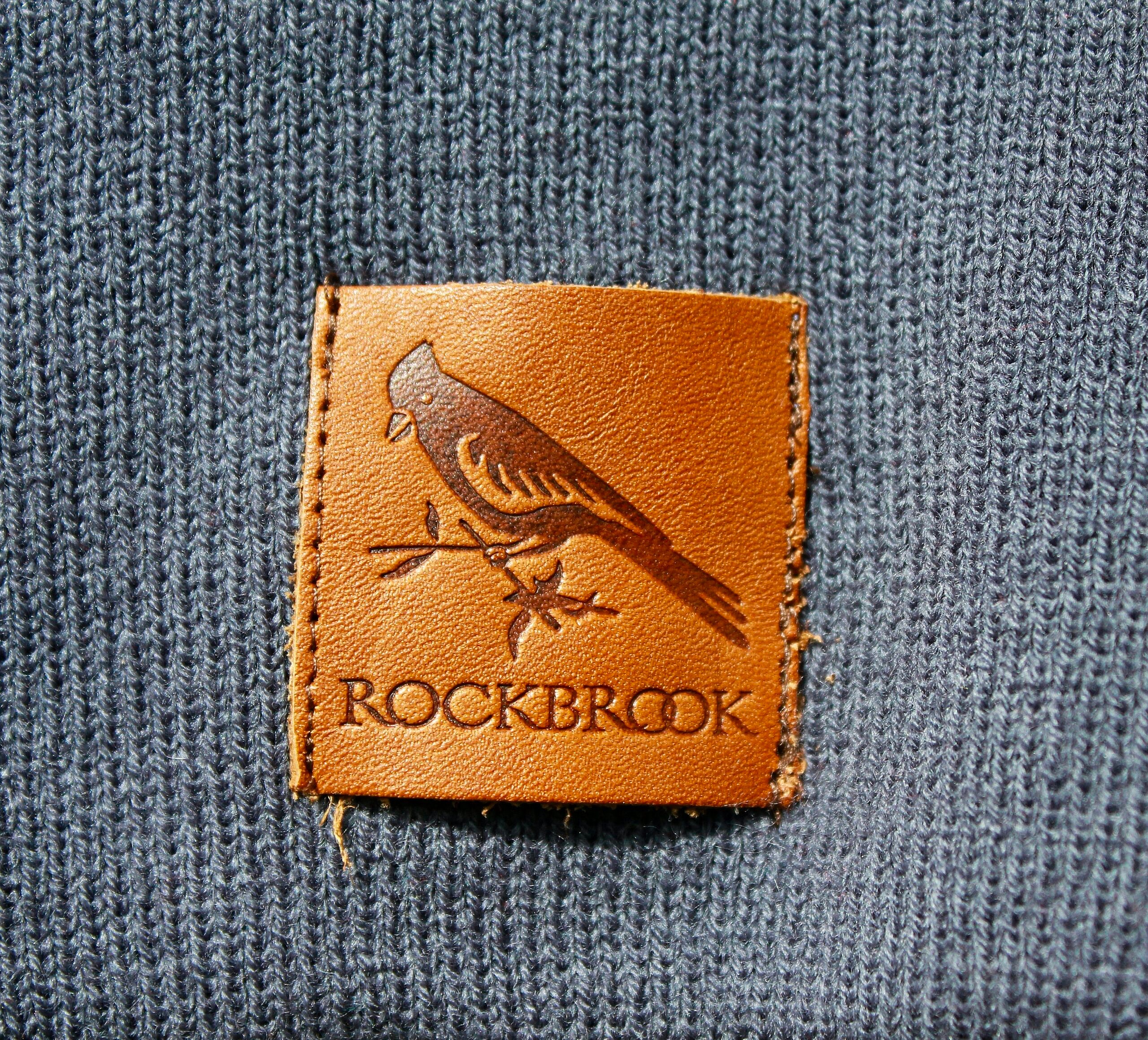 Knitted Gray Beanie with Leather RBC Patch | Rockbrook Summer Camp